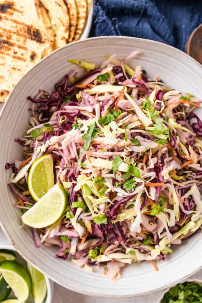 Taco Slaw With Cilantro Lime Dressing (That Is Not Boring!) - Cookrita